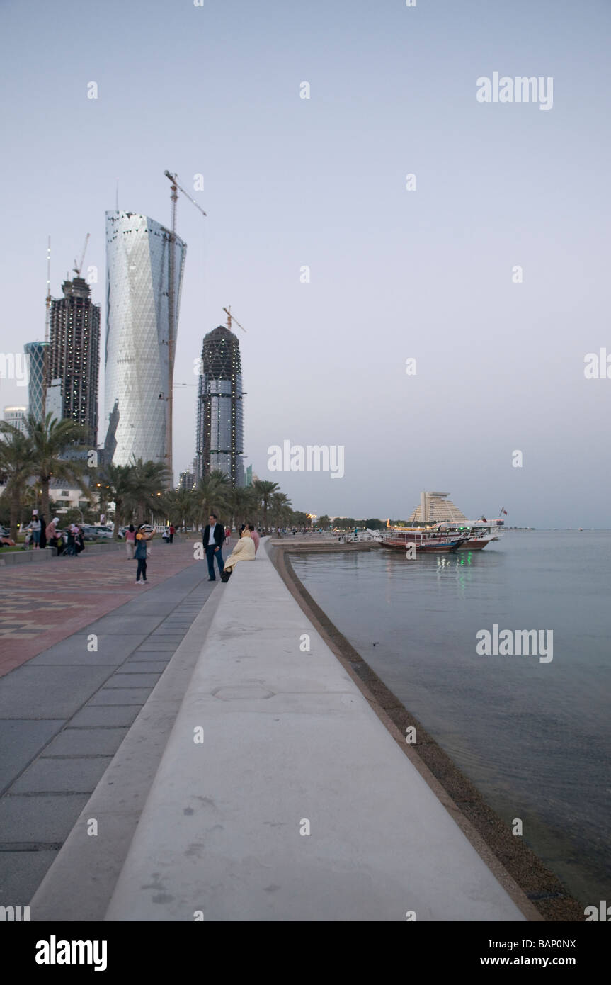 financial buildings at sunset on the corniche in Doha Qatar Stock Photo ...