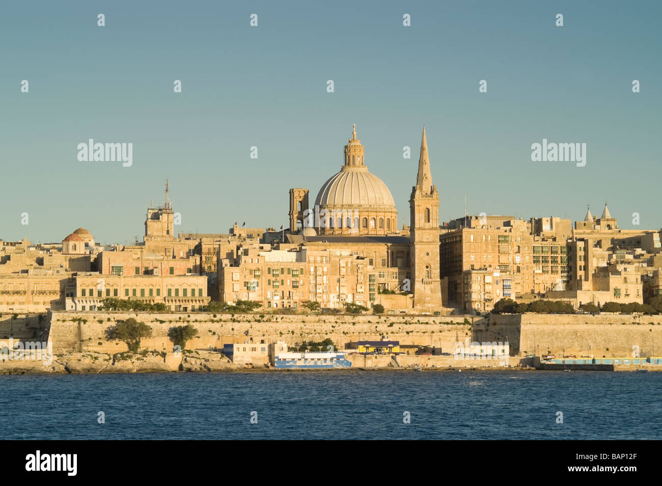Valletta skyline at sunset with a clear sky Malta Stock Photo - Alamy