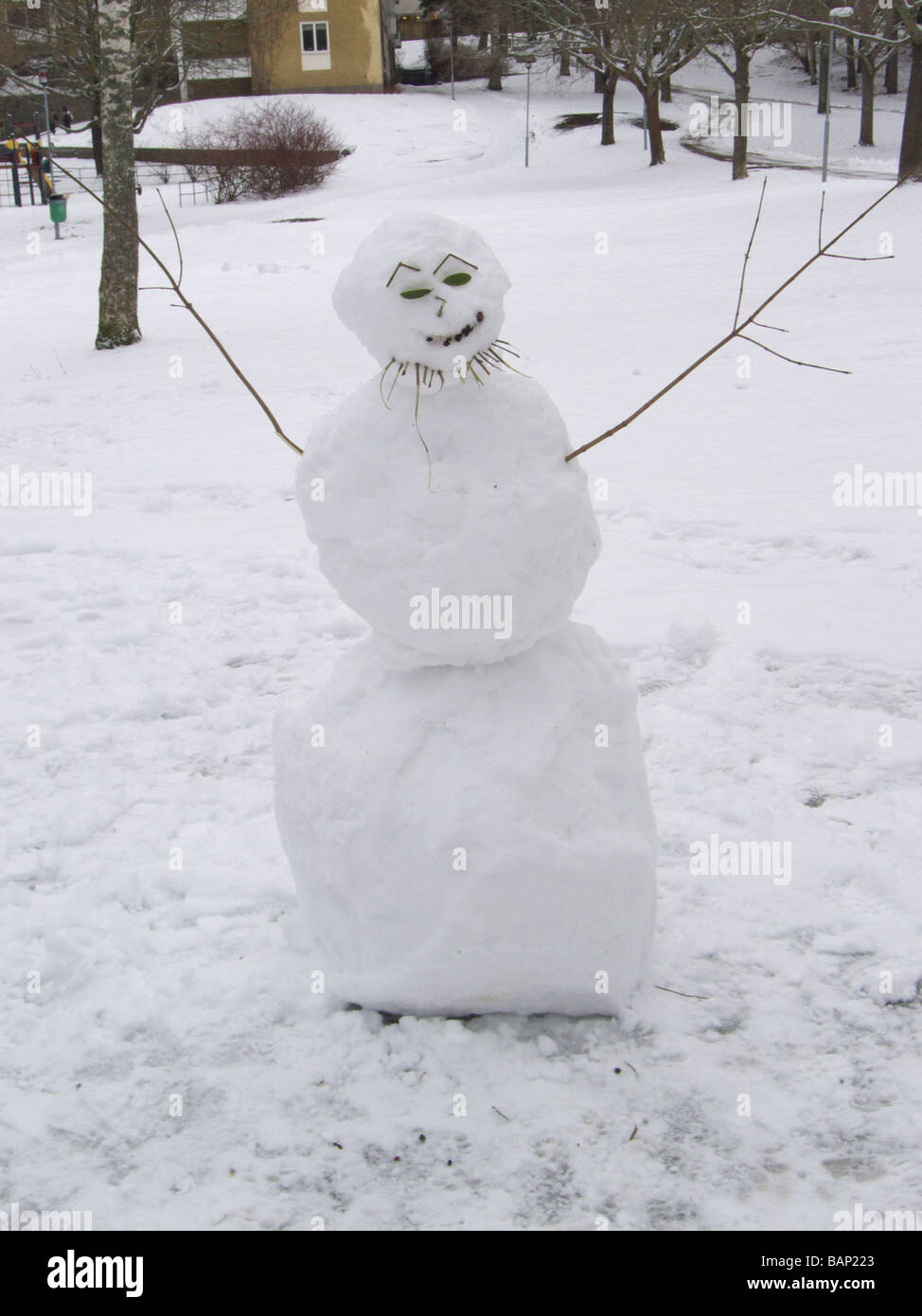 Snowman with hands in the air Stock Photo - Alamy