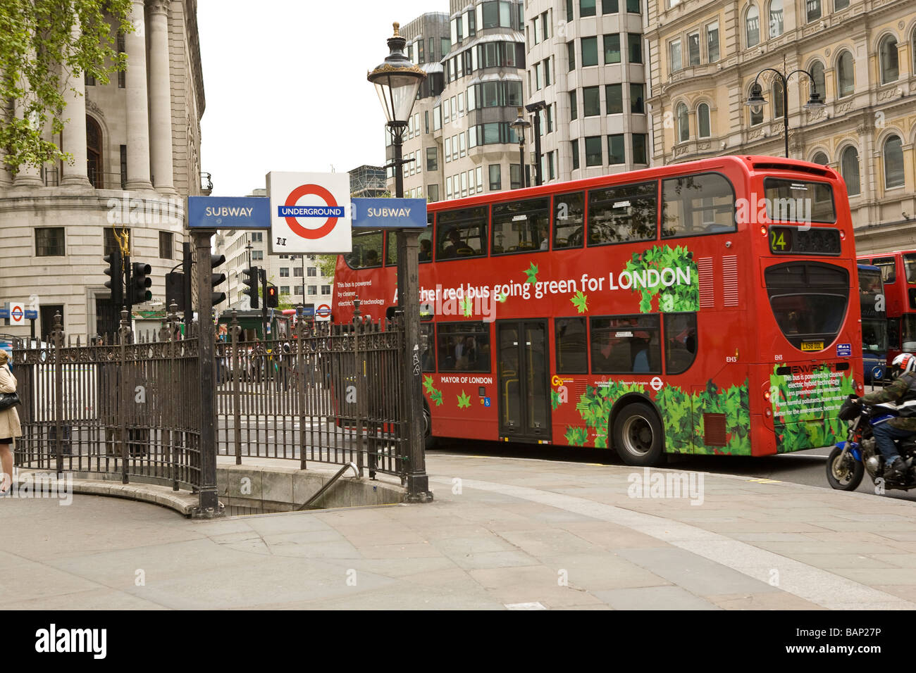 London Underground at Trafalgar Square with a red bus passing by Stock ...