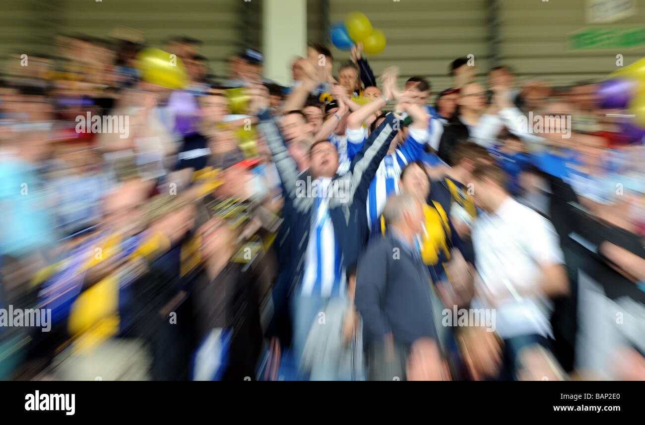 Football fans cheering with zoom blur camera lense effect Stock Photo ...