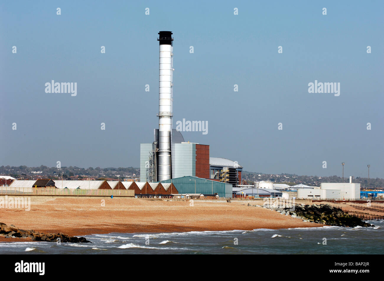 The gas fired Shoreham Power Station chimney against a blue sky Stock ...
