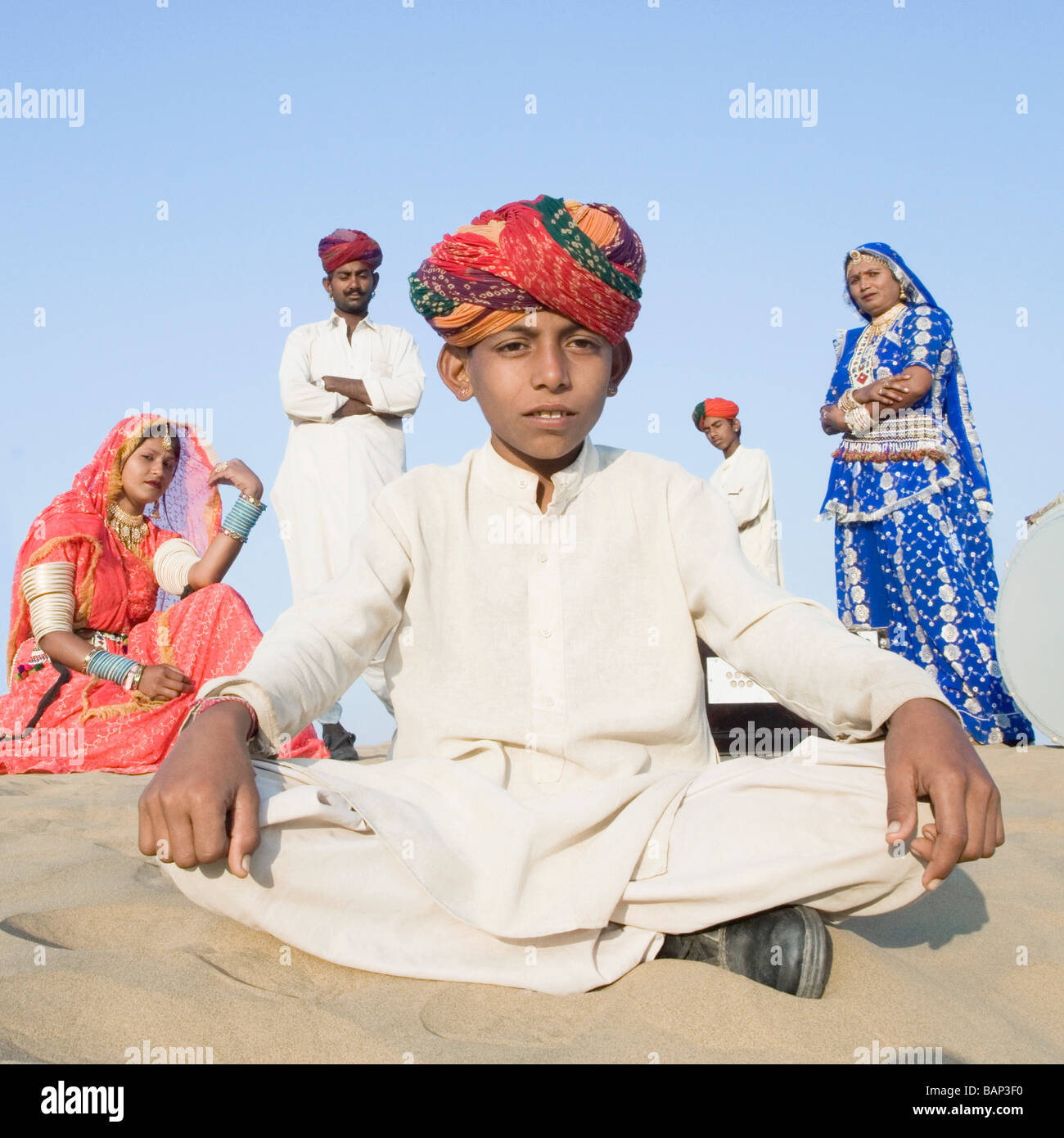 Standing in the desert in front of a dune hi-res stock photography and ...