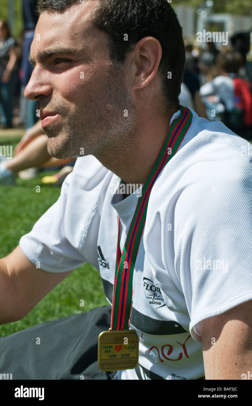 Runner relaxing after finishing the London marathon in 2009 Stock Photo ...