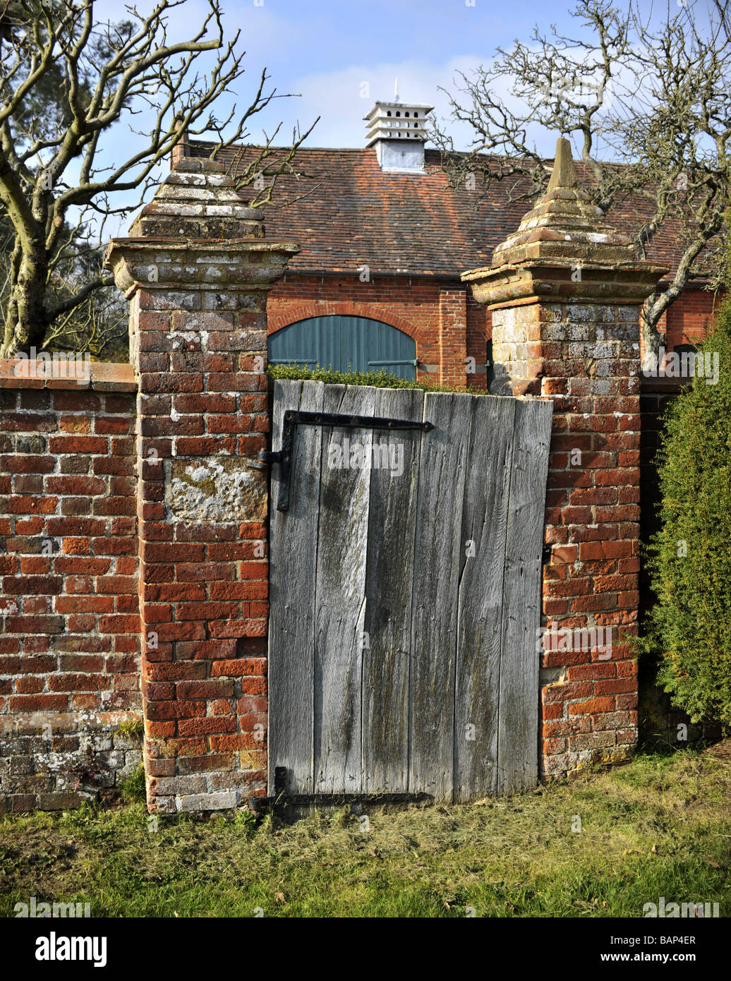 an old gate entrance to a garden Stock Photo - Alamy