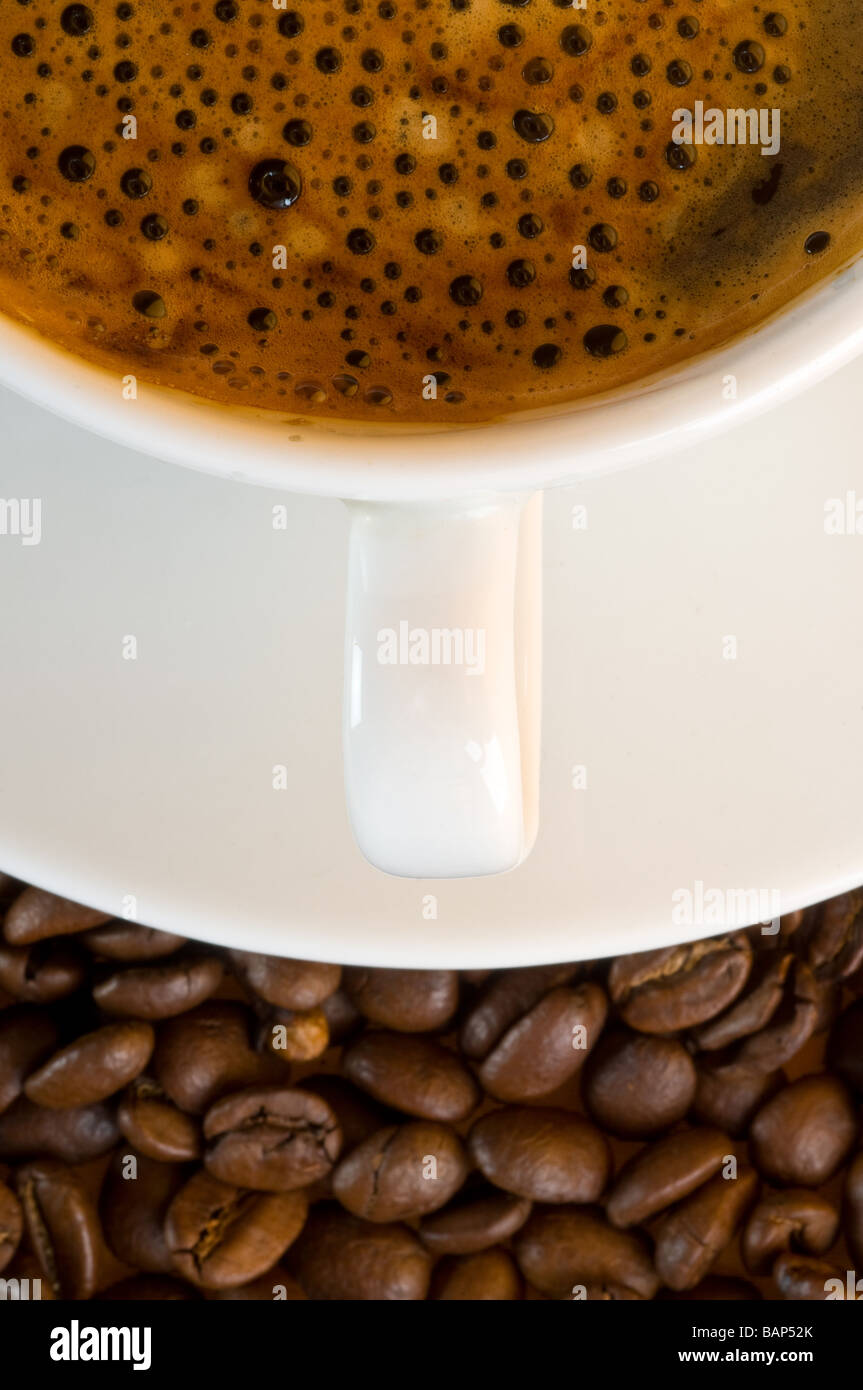 Coffee with on a gold background Stock Photo - Alamy