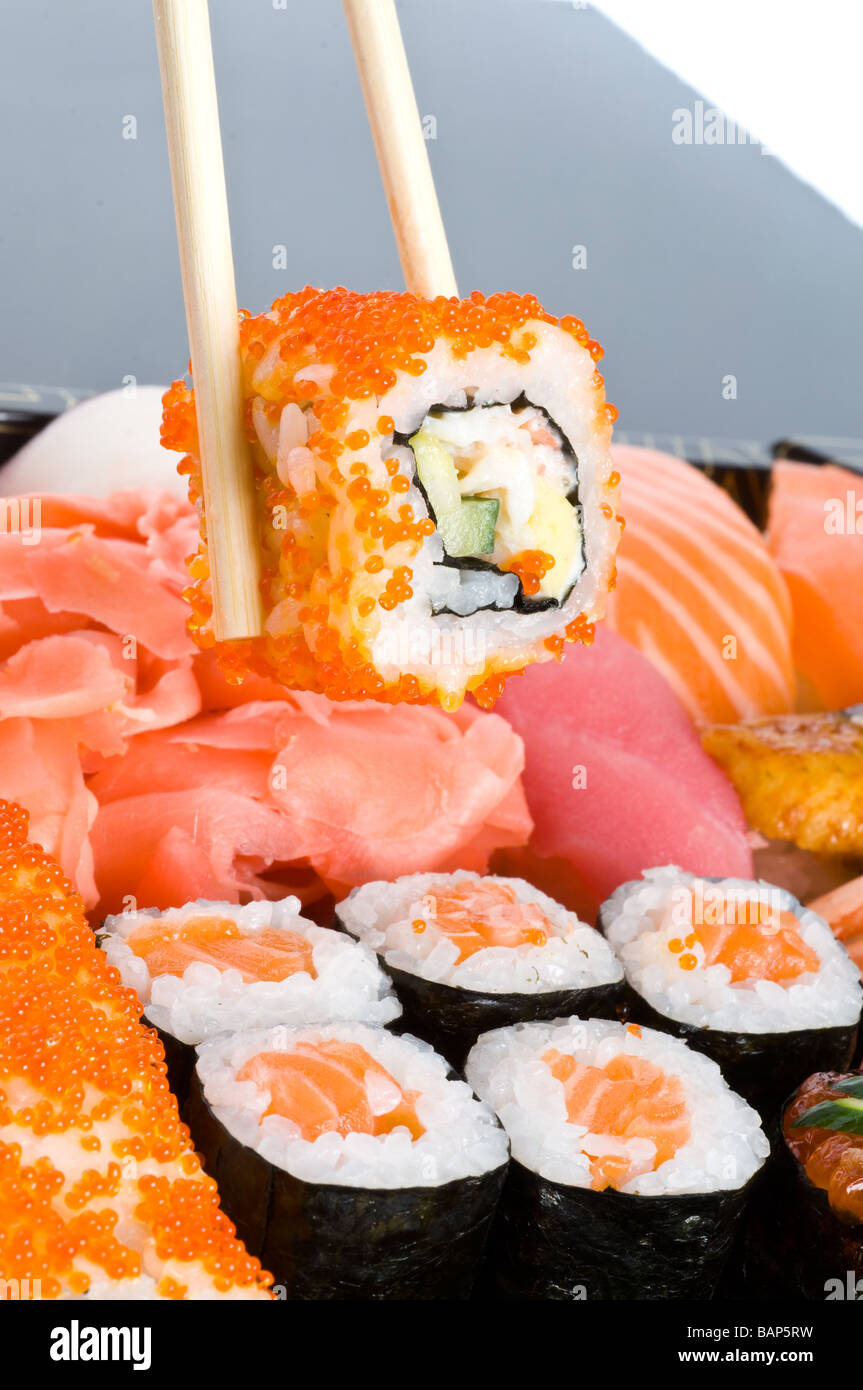 raw fresh sushi and rolls Stock Photo - Alamy