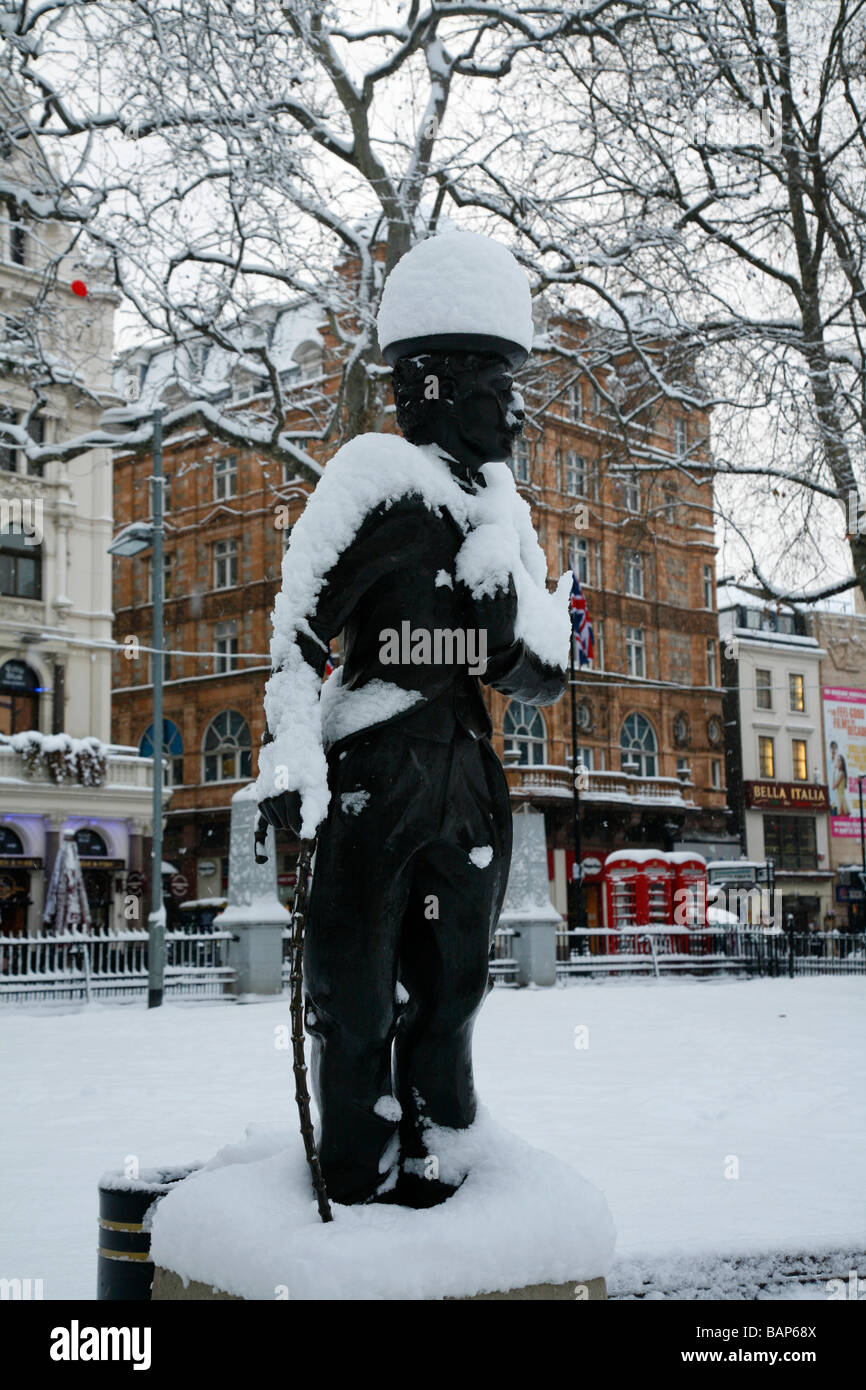 Snow-covered statue of Charlie Chaplin in Leicester Square, London, UK ...
