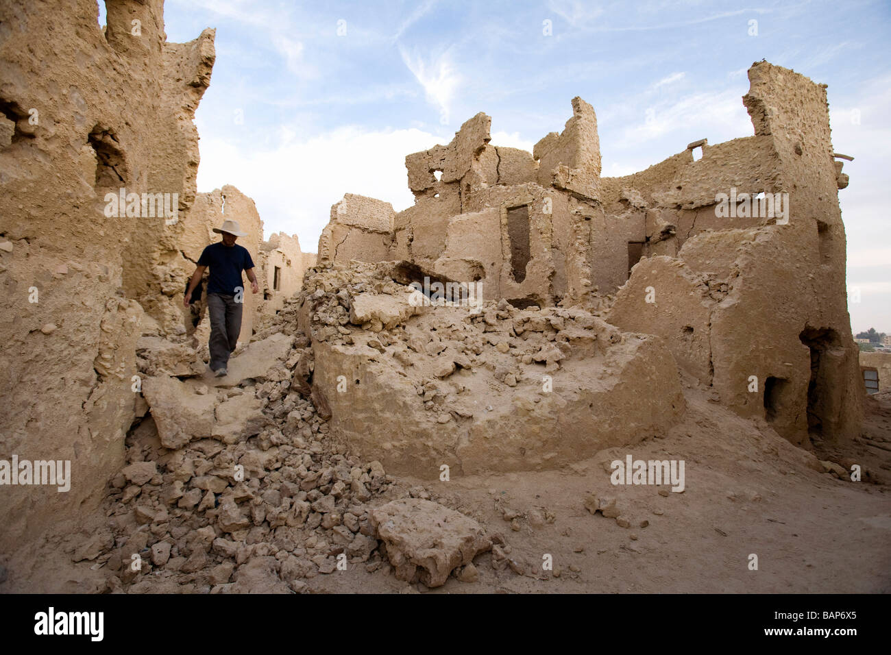 Siwa Oasis, Egypt; Man exploring the ruins Stock Photo - Alamy