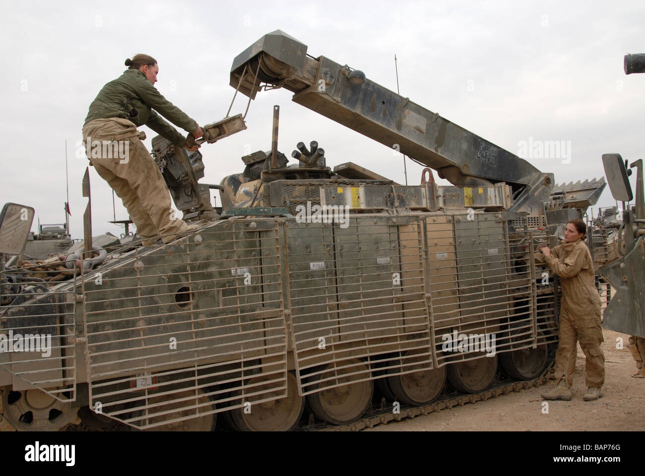 Basra British base COB. Two women soldiers repair tanks Stock Photo - Alamy