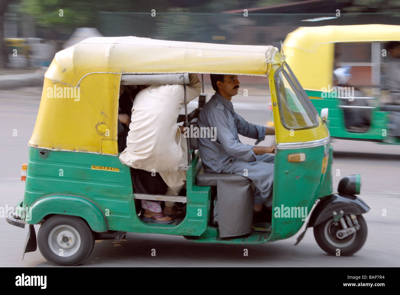 Auto rickshaws in busy traffic in Delhi India Stock Photo - Alamy