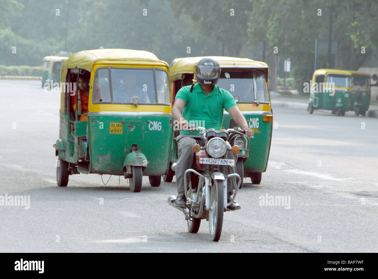 Auto rickshaws in busy traffic in Delhi India Stock Photo - Alamy