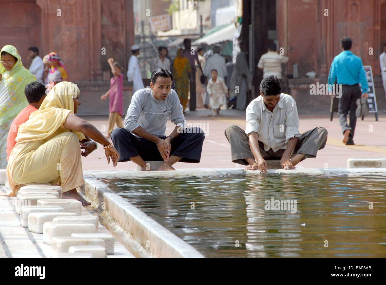 Washing before prayers at the Jama Masjid (Friday Mosque) Delhi India ...