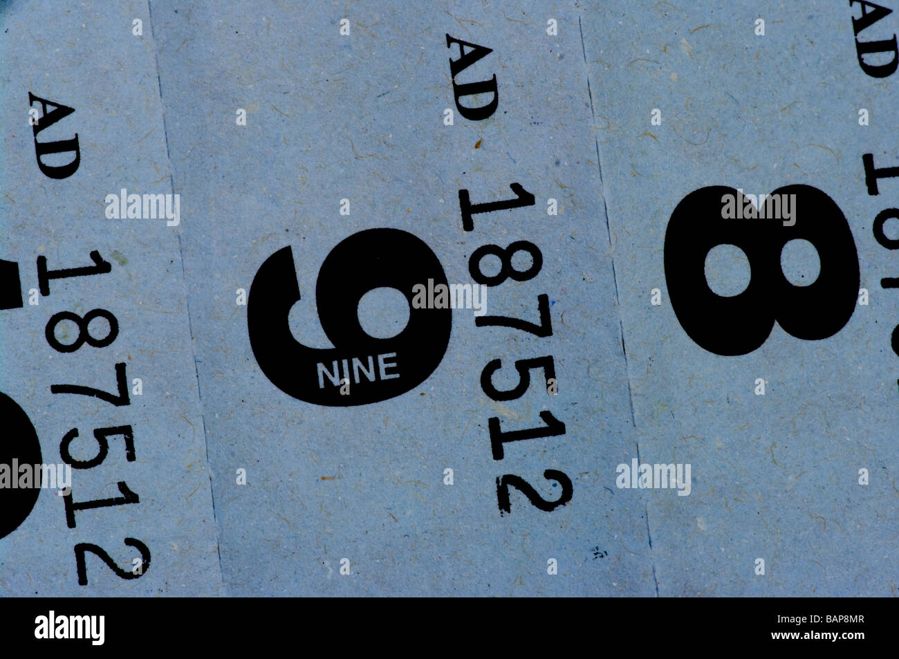 Blue Raffle Tickets cloakroom ticket Stock Photo - Alamy