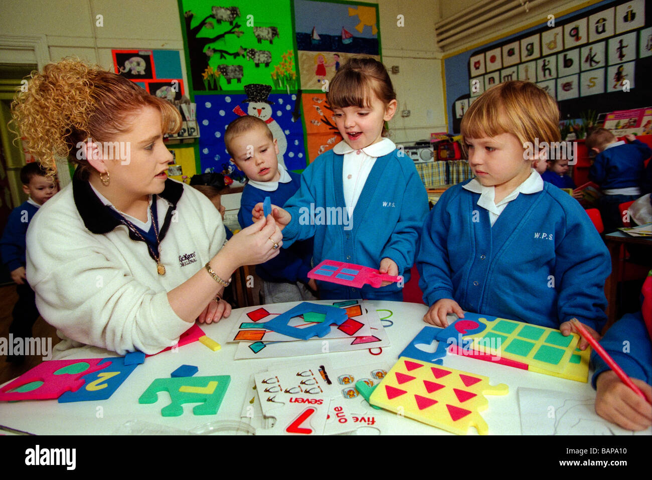 teacher classroom uk. Pupils being taught by teacher in classroom of ...