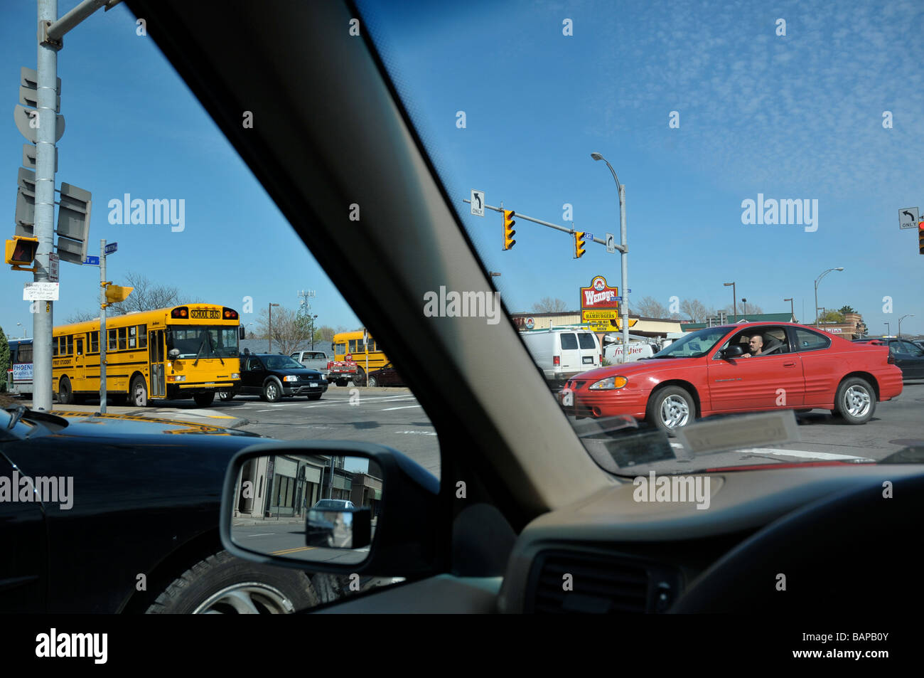 School bus at busy intersection Stock Photo - Alamy