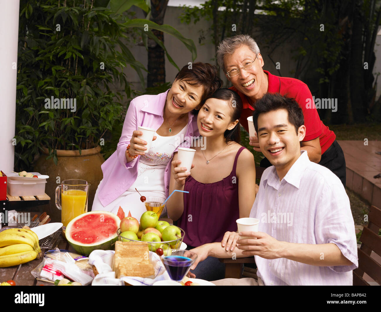 happy family at a party Stock Photo - Alamy