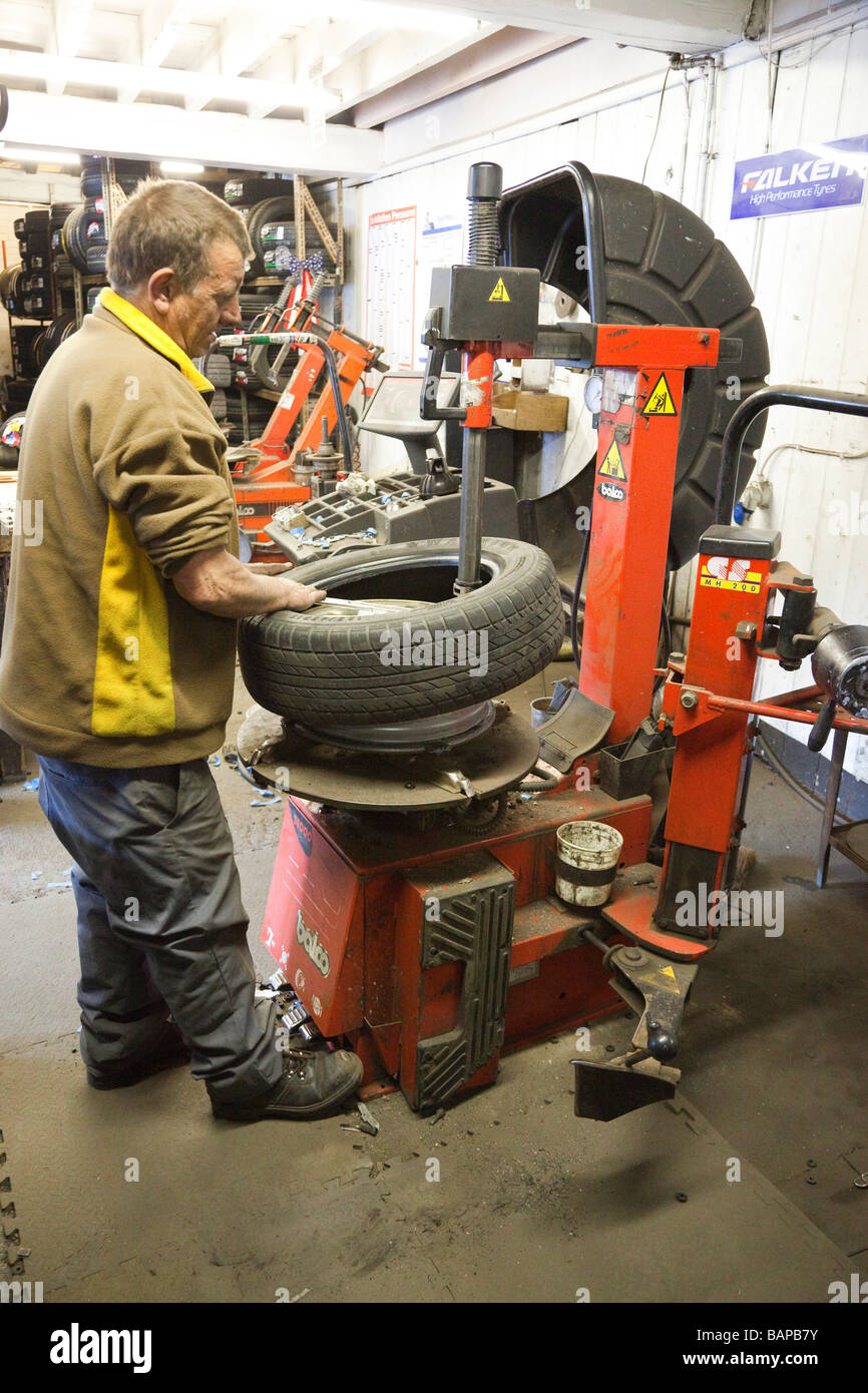 Tyre fitter hi-res stock photography and images - Alamy