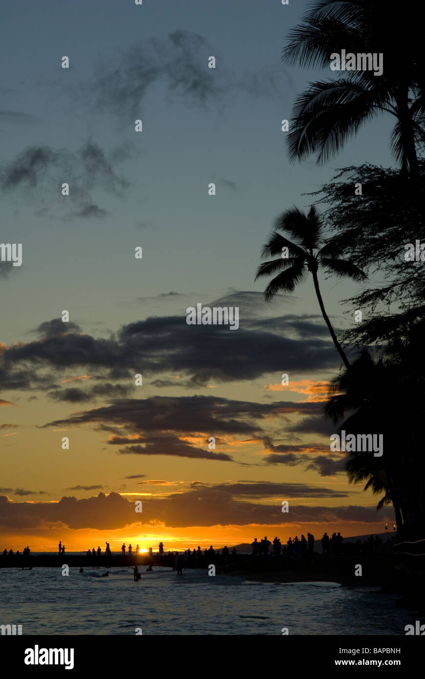 Sunset on Waikiki Beach in Oahu Hawaii Stock Photo - Alamy