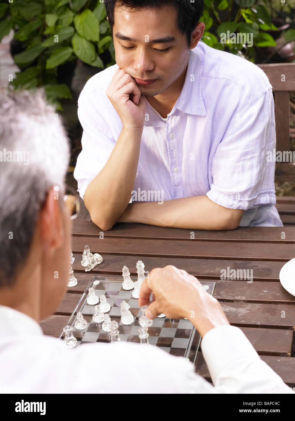 son is thinking for the next move Stock Photo - Alamy