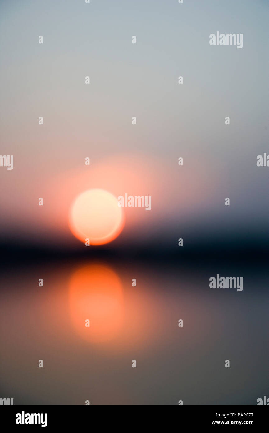 Reflection of sun in a lake, Hussain Sagar, Hyderabad, Andhra Pradesh ...