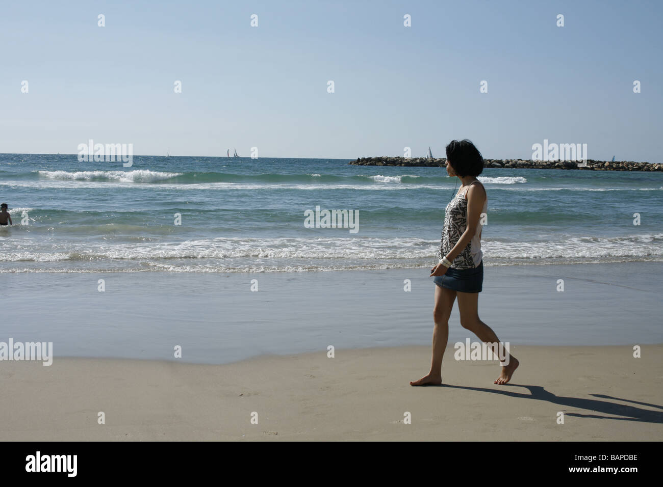 Walking on the beach Stock Photo - Alamy