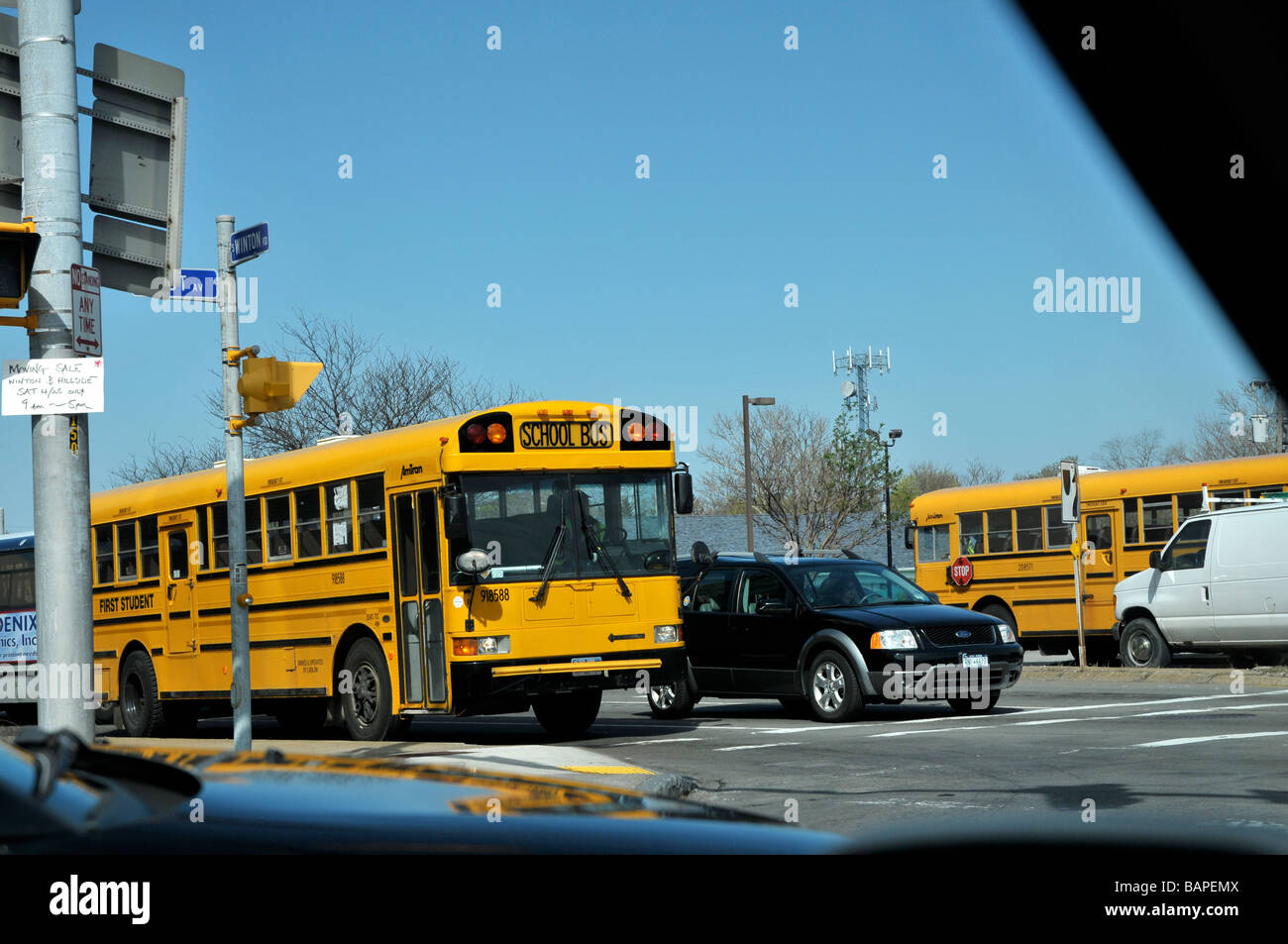 School bus at busy intersection Stock Photo - Alamy