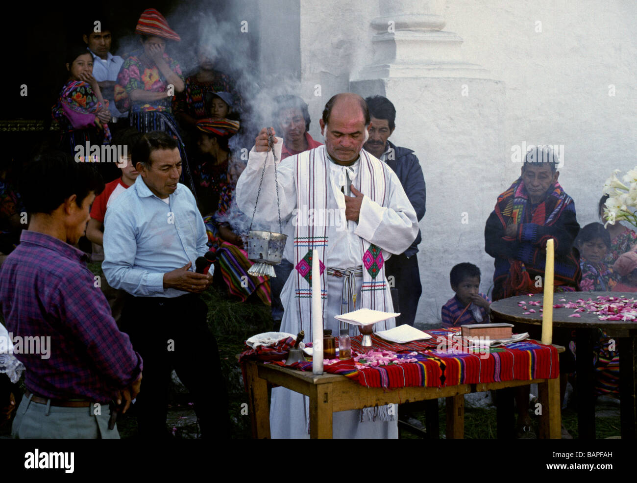 CATHOLIC PRIEST giving CHRISTIAN SERVICE on CHURCH STEPS ...