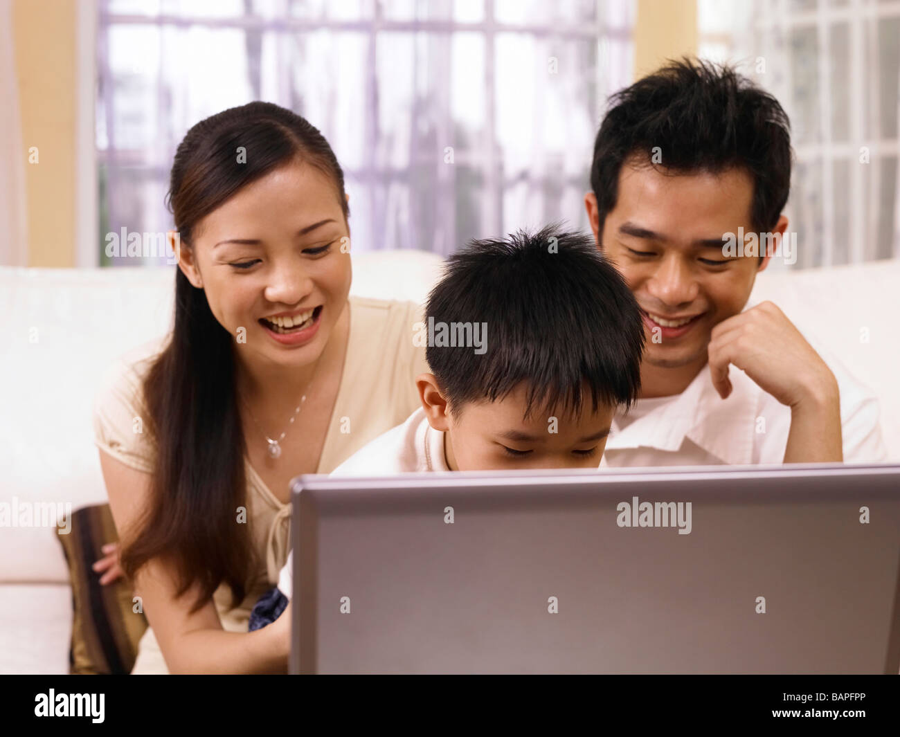 parent enjoying computer time with child Stock Photo - Alamy