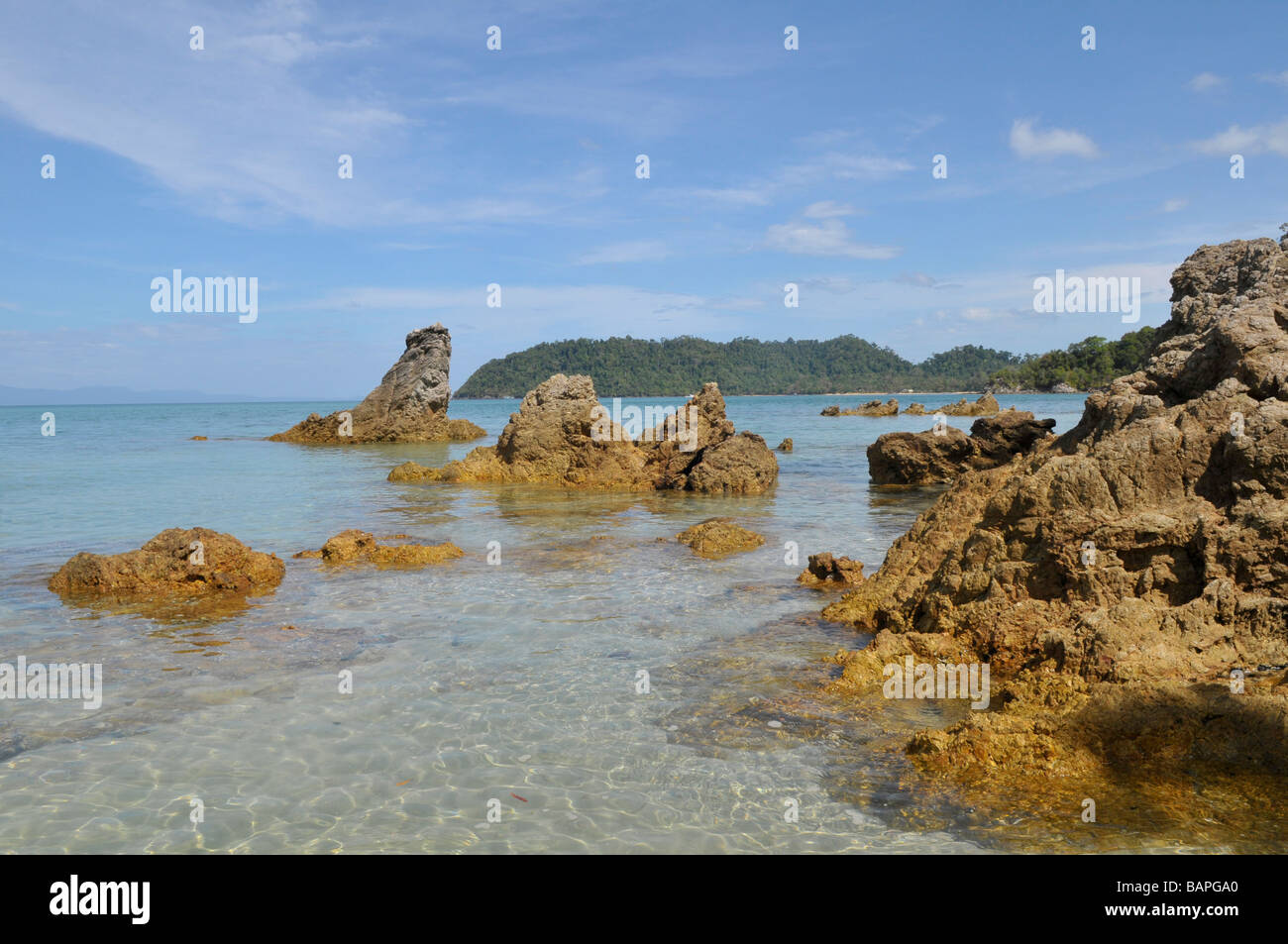 small rock mountain in the sea and by khaokwai beach, koh phayam ...