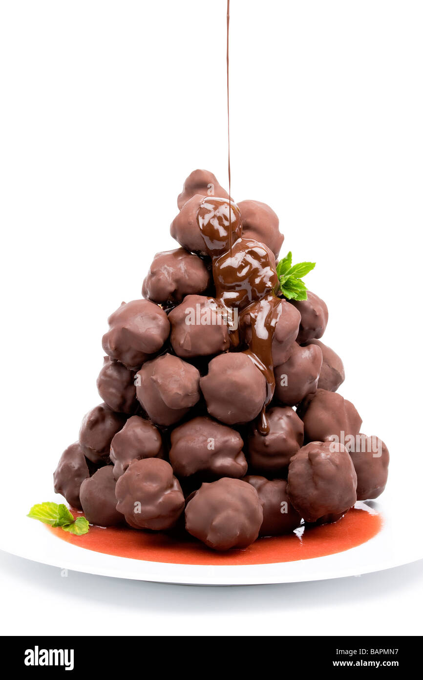 Pyramid of chocolate coated profiteroles Stock Photo - Alamy