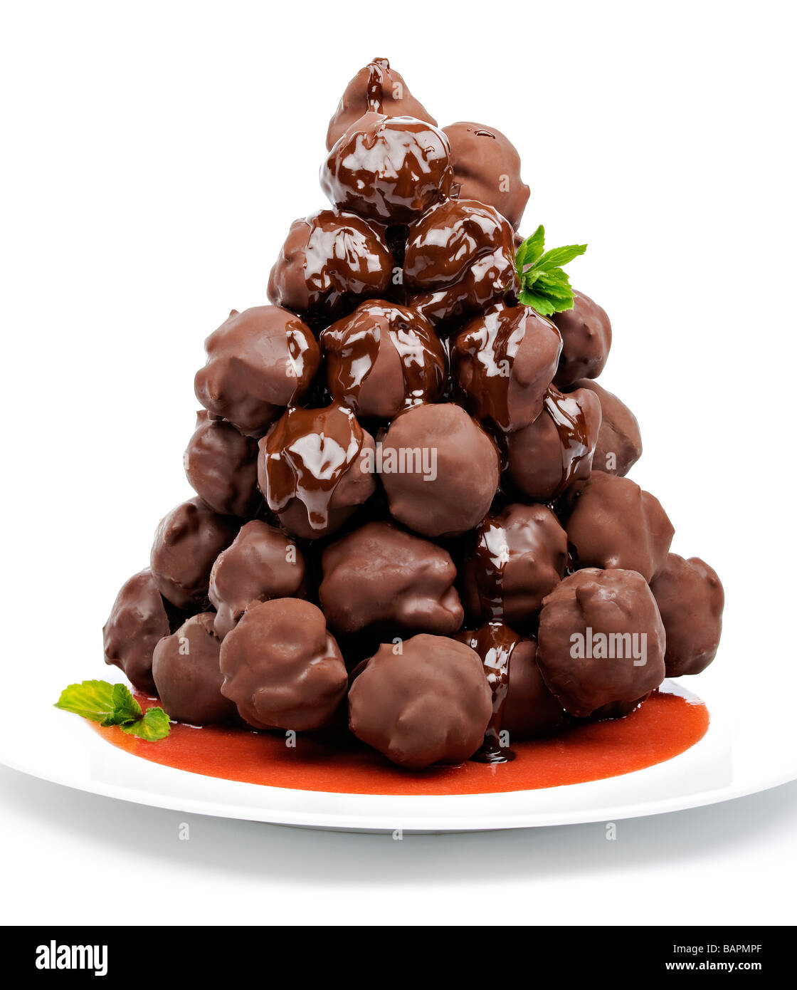 Pyramid of chocolate coated profiteroles Stock Photo - Alamy