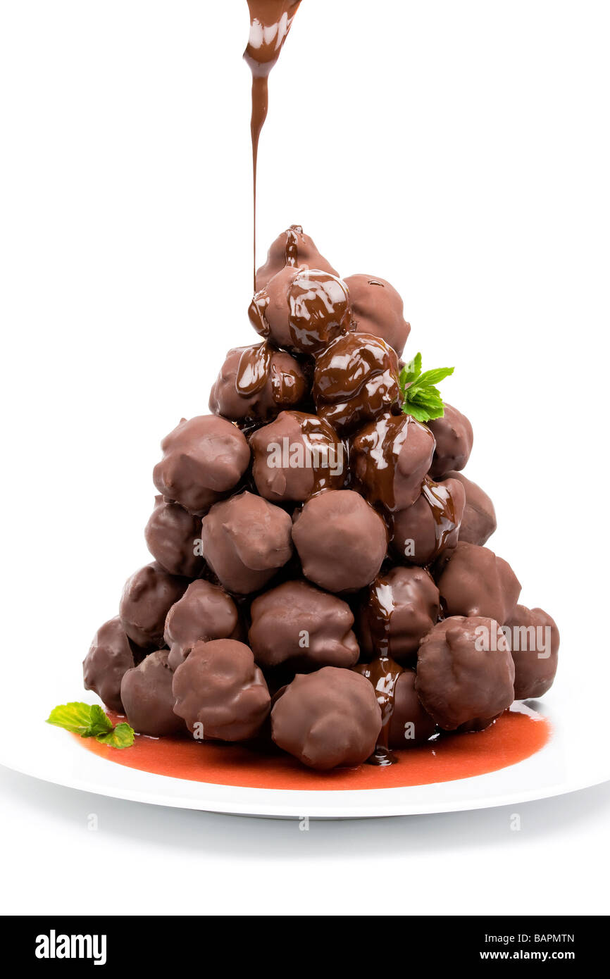 Pyramid of chocolate coated profiteroles Stock Photo - Alamy
