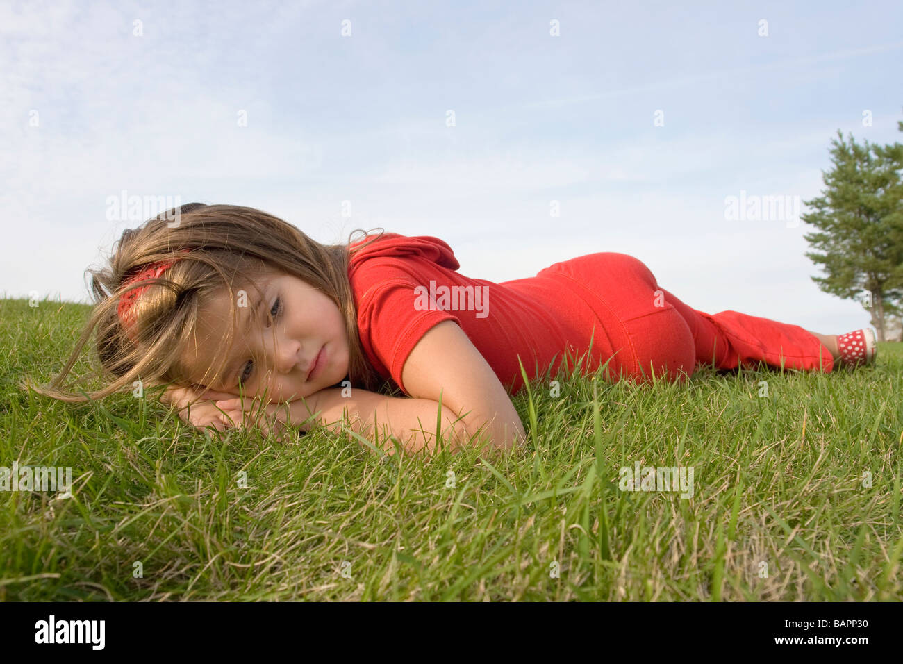 Seven year old girl laying hi-res stock photography and images - Alamy