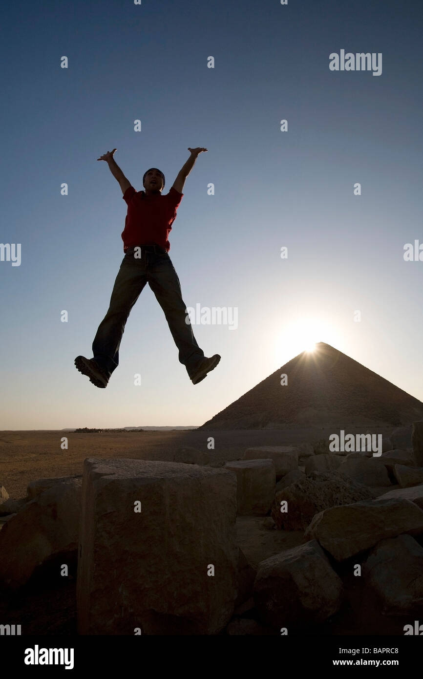 The Red Pyramid, Dahshur necropolis, Egypt; man jumping in front of ...