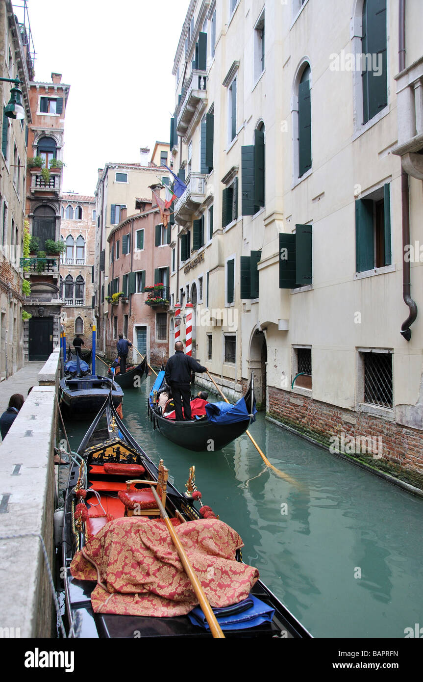 Venetian gondolas on the canal hi-res stock photography and images - Alamy