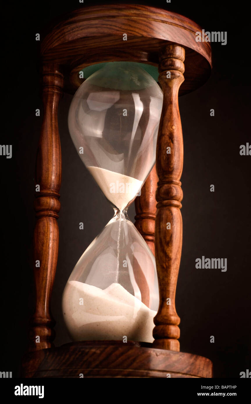 Wood antique hourglass timer Stock Photo - Alamy
