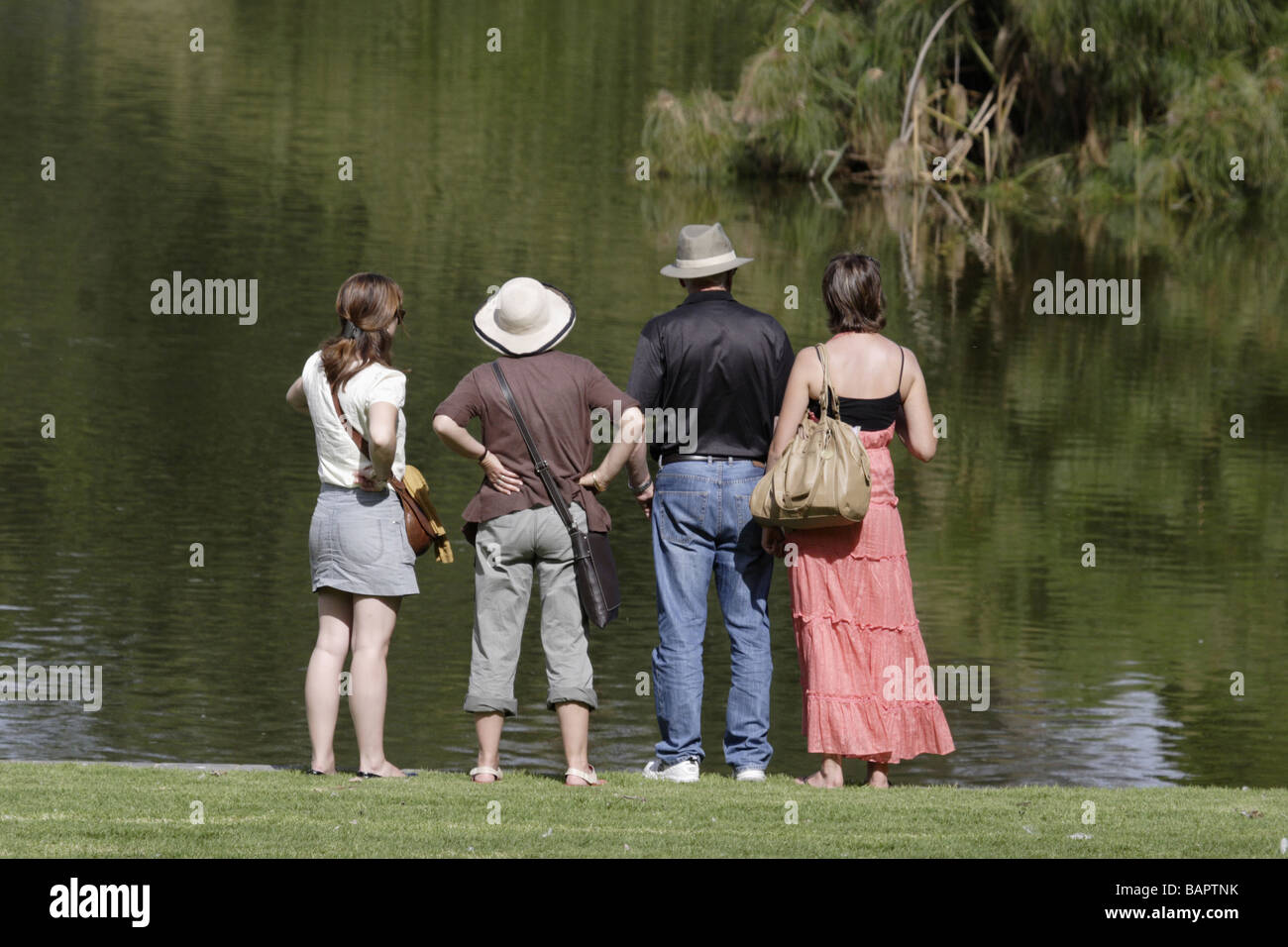 family at the lake Stock Photo - Alamy