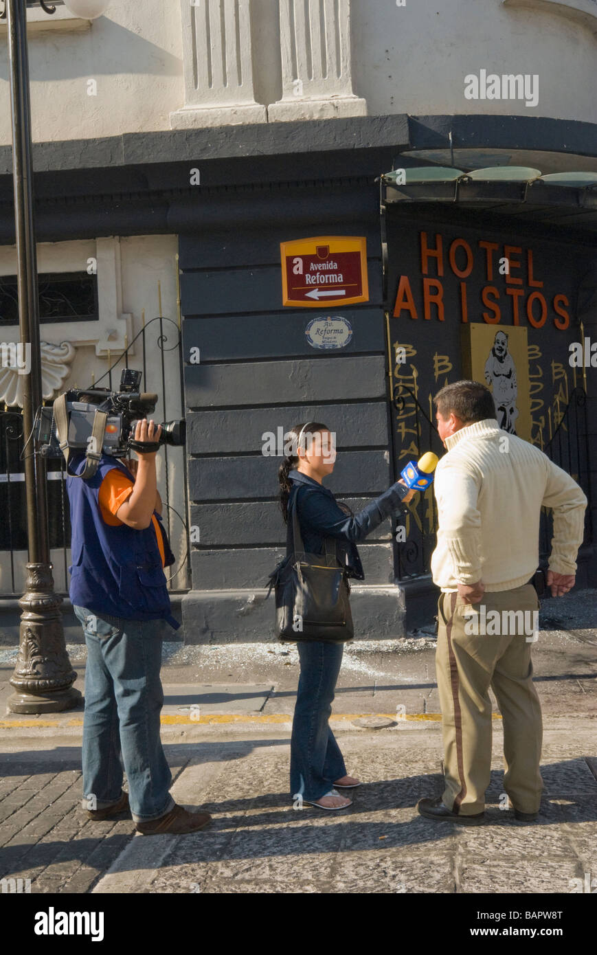 News crew interviewing police chief at the scene of a car and truck ...
