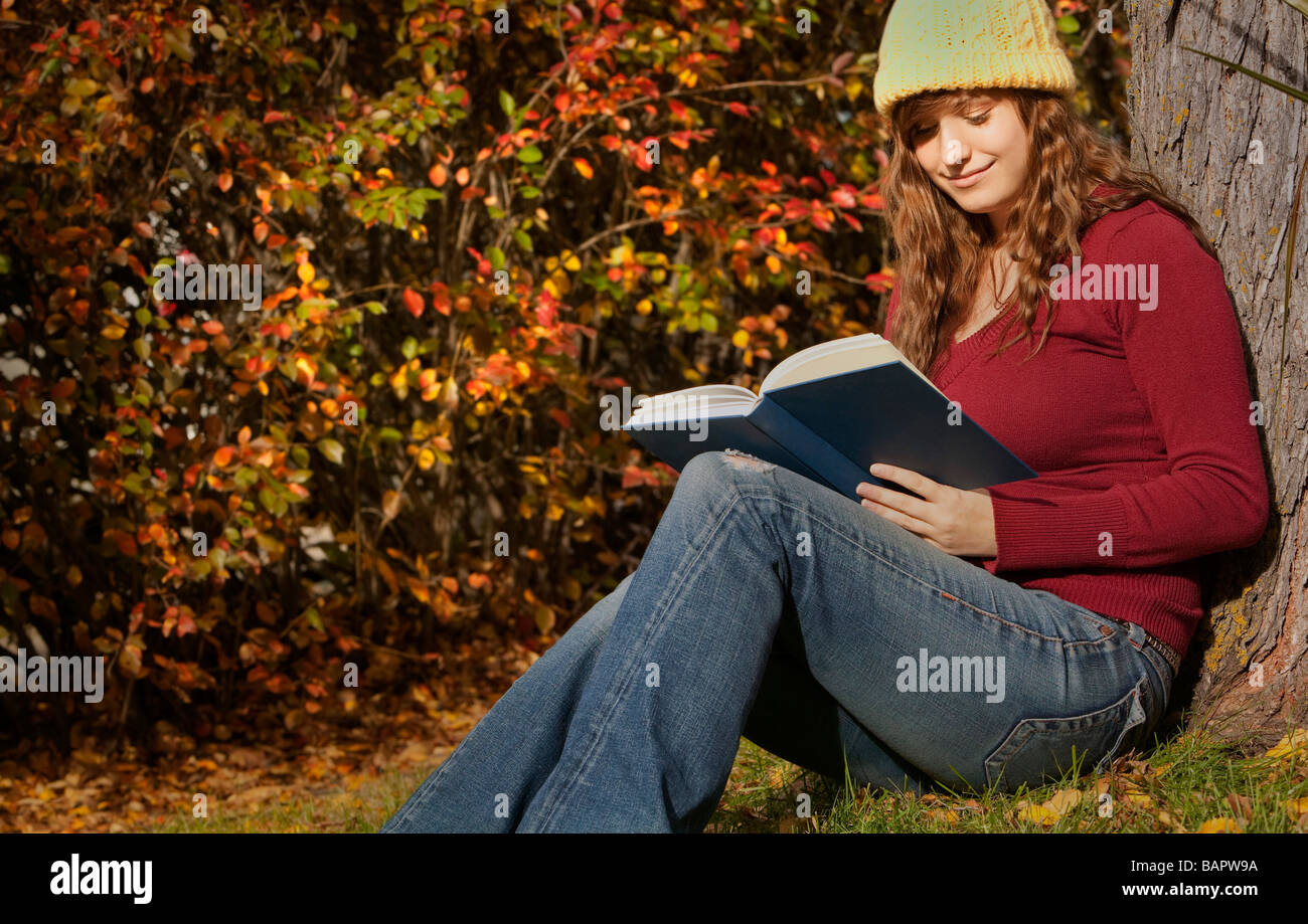 Reading a book Stock Photo - Alamy