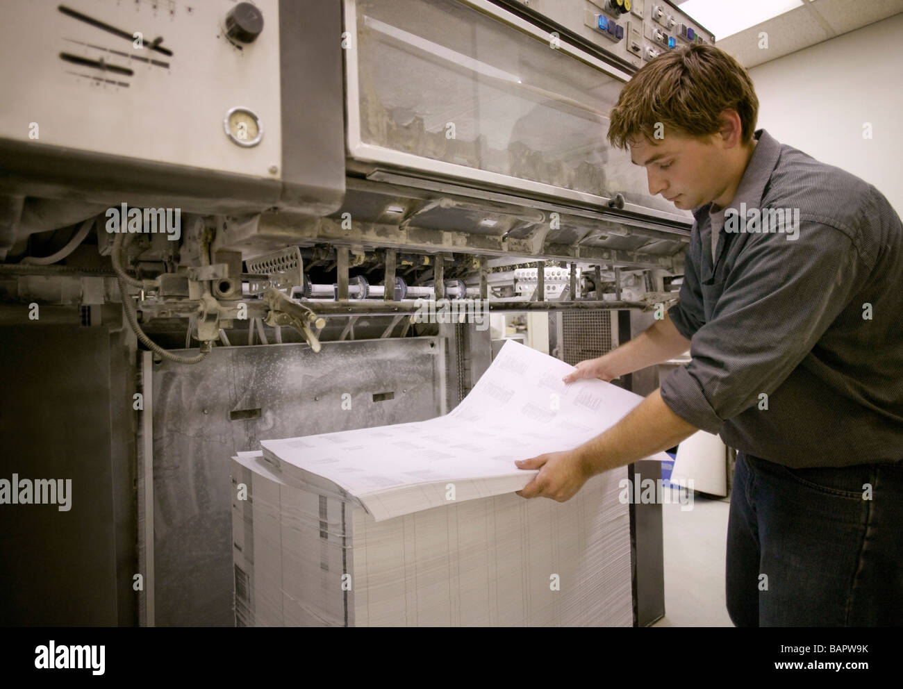 Man at a printing press Stock Photo - Alamy