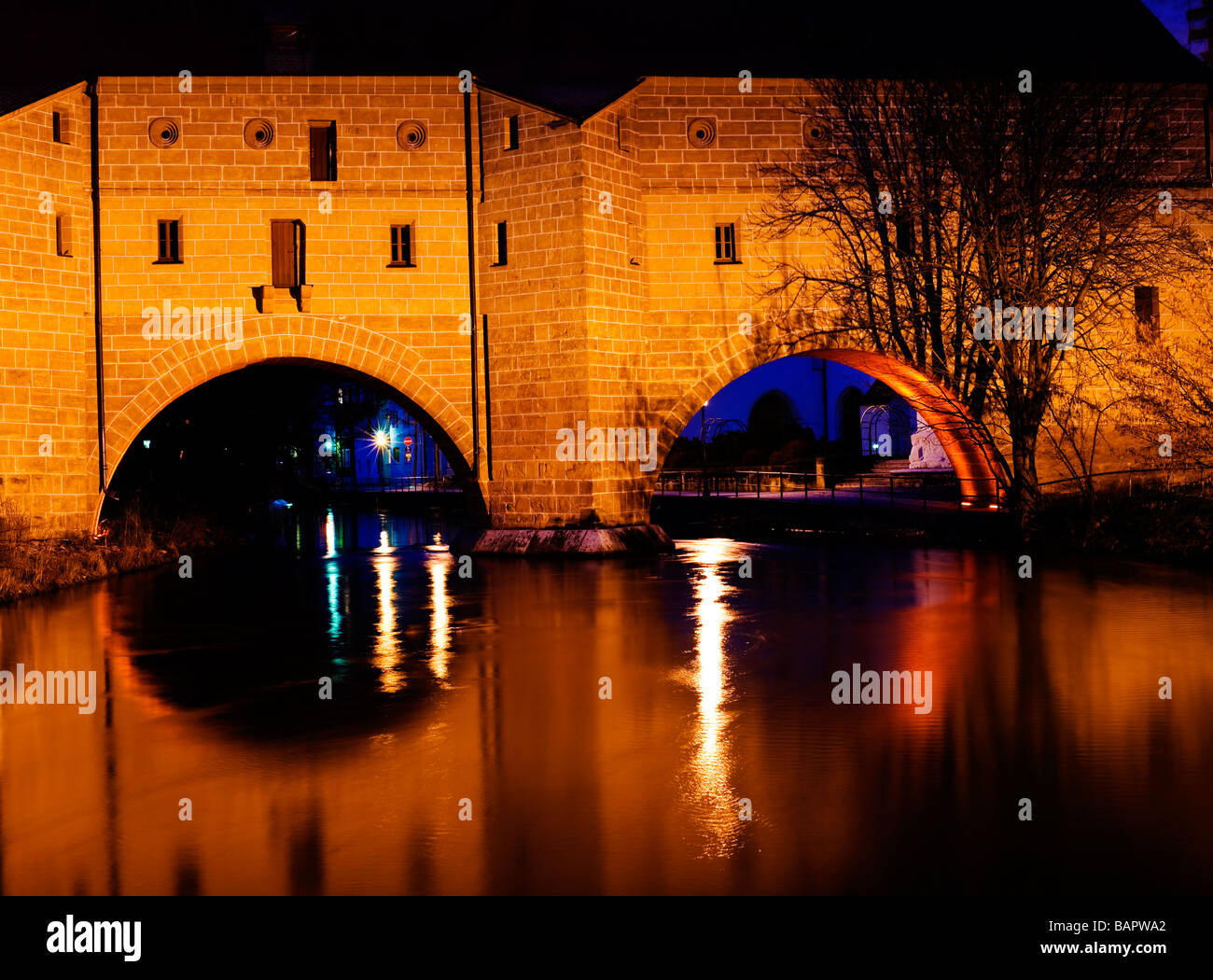 night shot of the Vils river under the city walls of Amberg, Germany ...