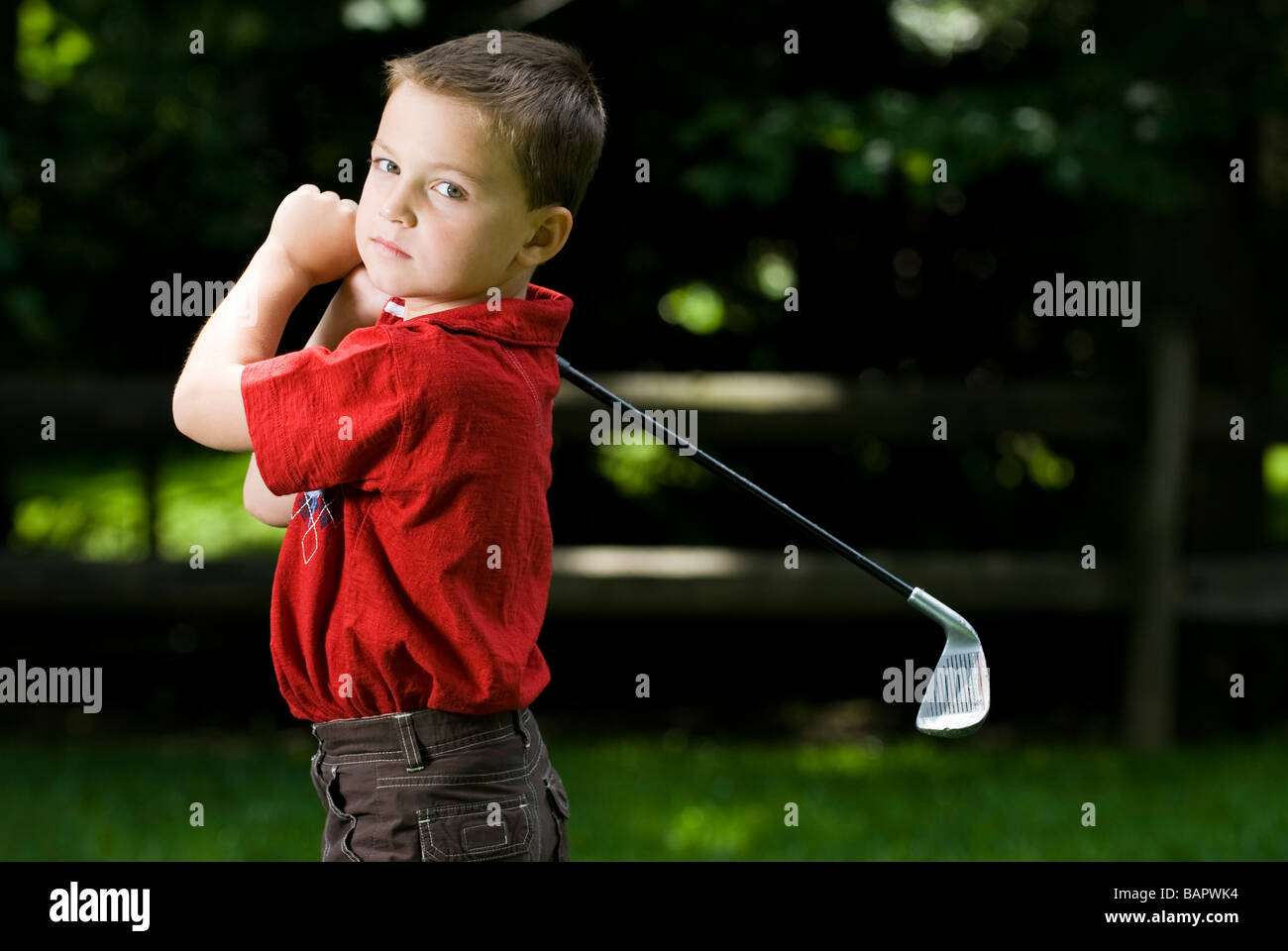 Golfer practising swing hi-res stock photography and images - Alamy