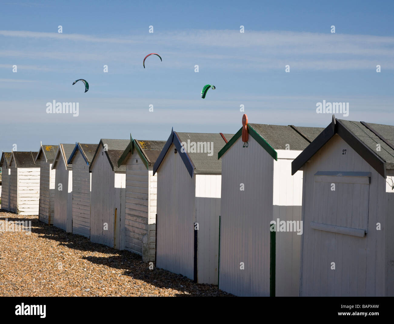 Kite surfing and Beach Huts Stock Photo - Alamy