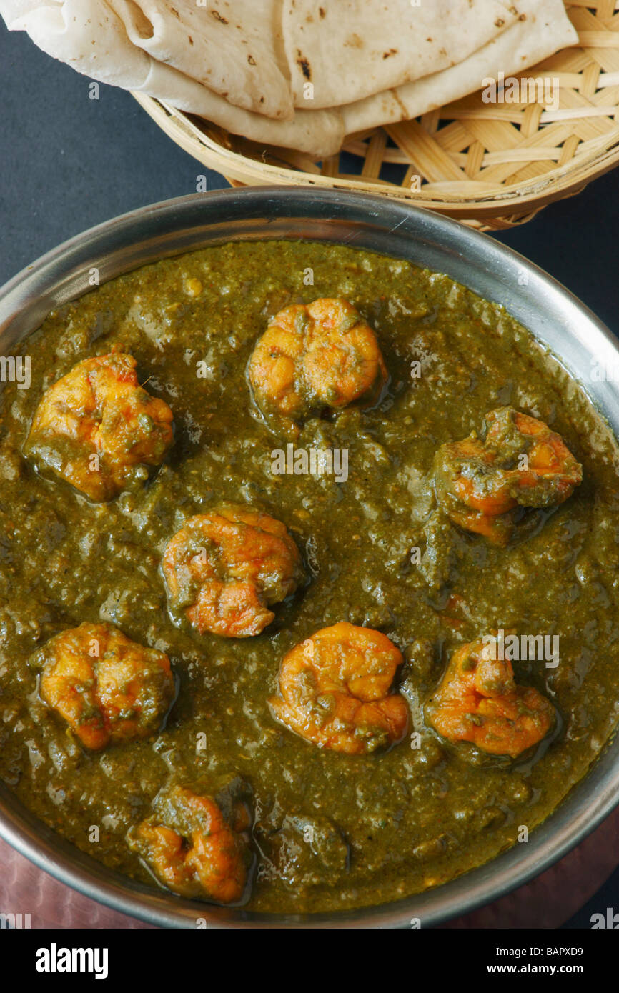 Saag Prawn is prepared from Prawns cooked in Palak gravy (Spinach) and ...