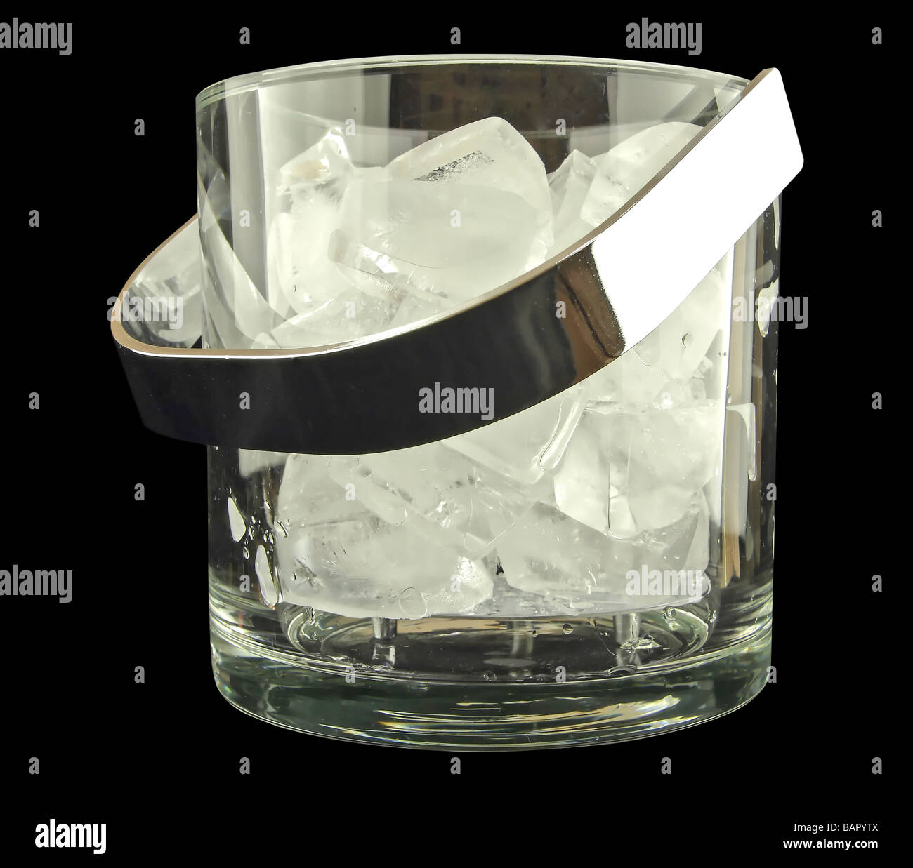 Glass ice bucket with ice Stock Photo - Alamy