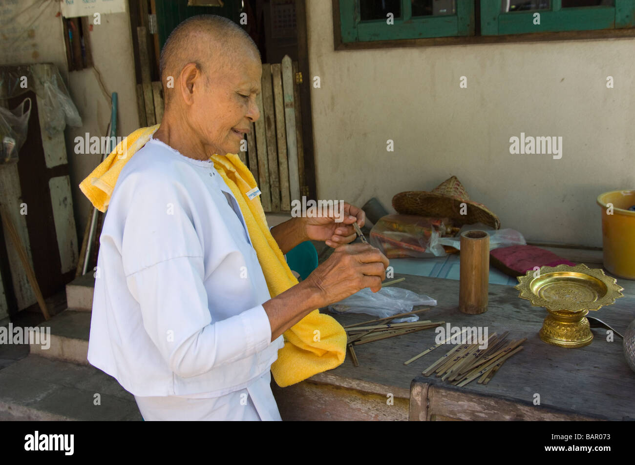Nun is cleaning fortunetelling stick Stock Photo - Alamy