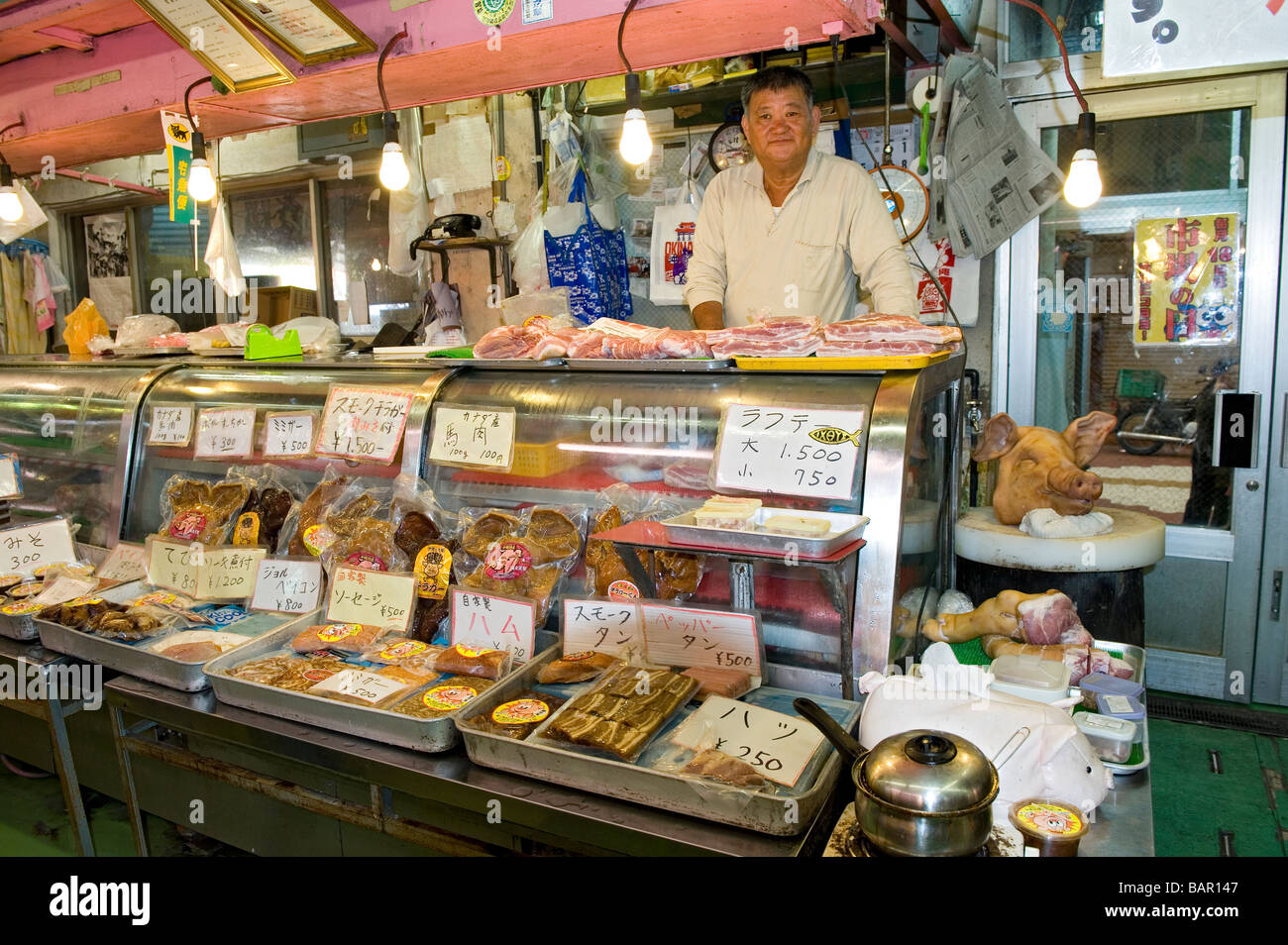Market Trader specializing in Okinawan Pork, Makishi Public Market ...