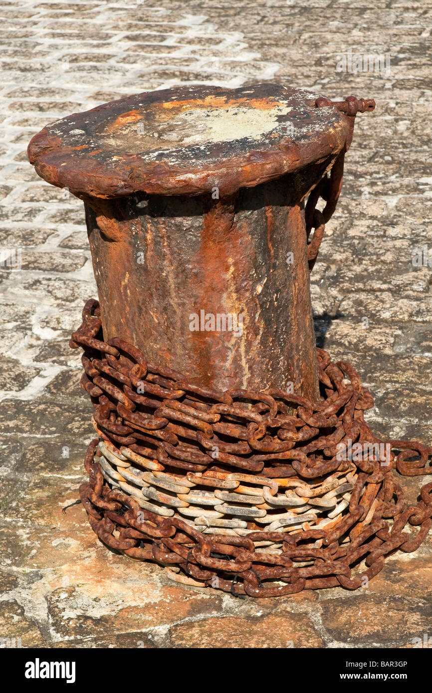An old rusty mooring post Stock Photo - Alamy