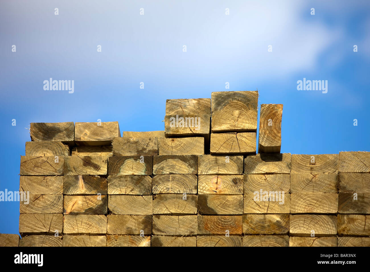 wood and timber in a builders yard Stock Photo - Alamy